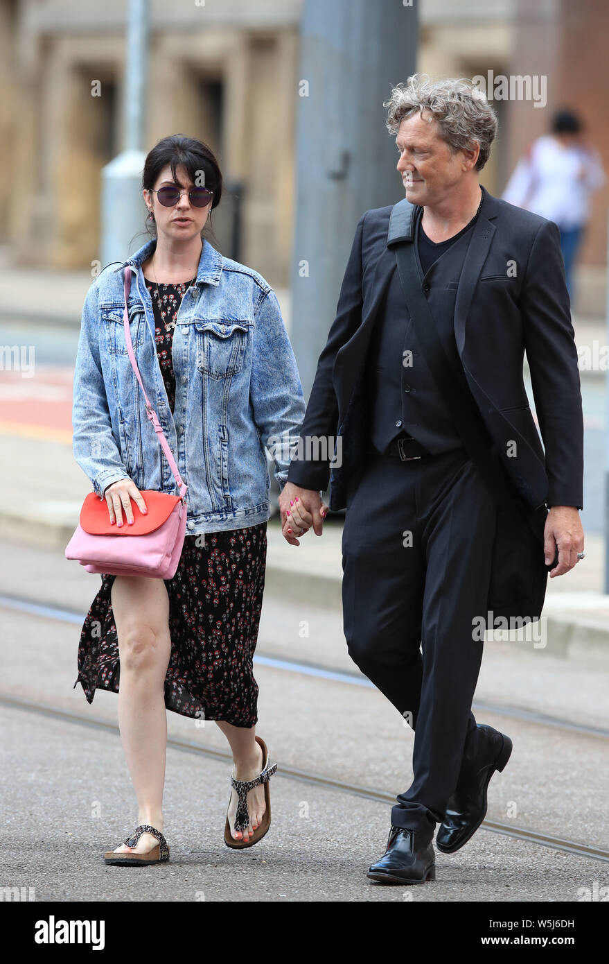 Emmerdale actor Mark Jordon and his partner Laura Norton outside ...