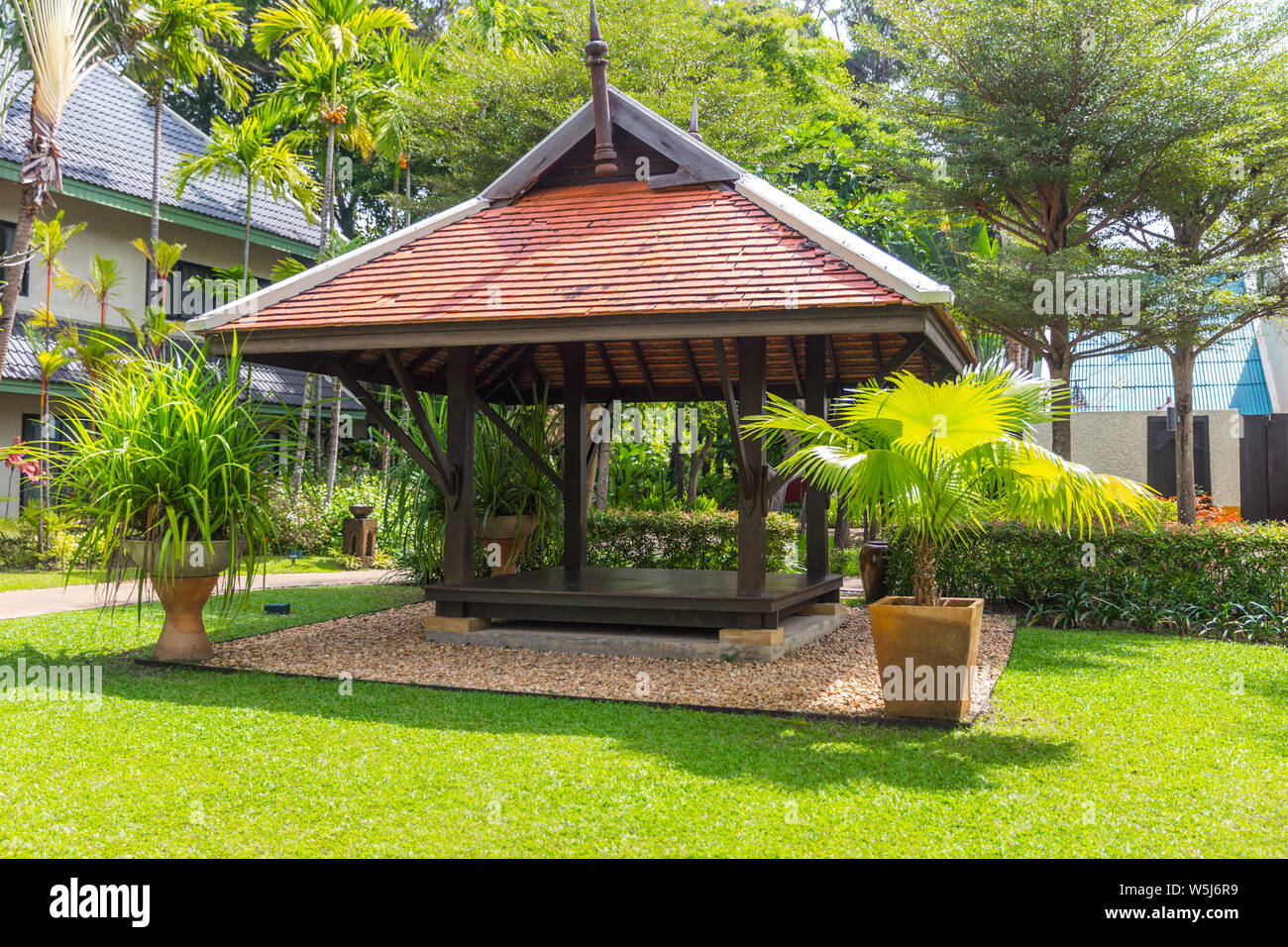 beautiful wooden gazebo in tropical nature Stock Photo - Alamy