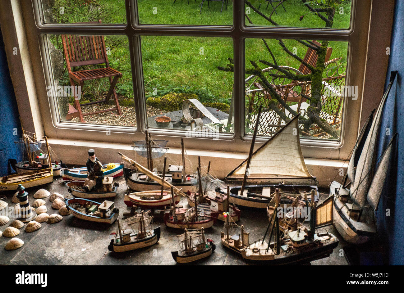 garden, seen through window, assorted toy ships, window ledge Stock ...
