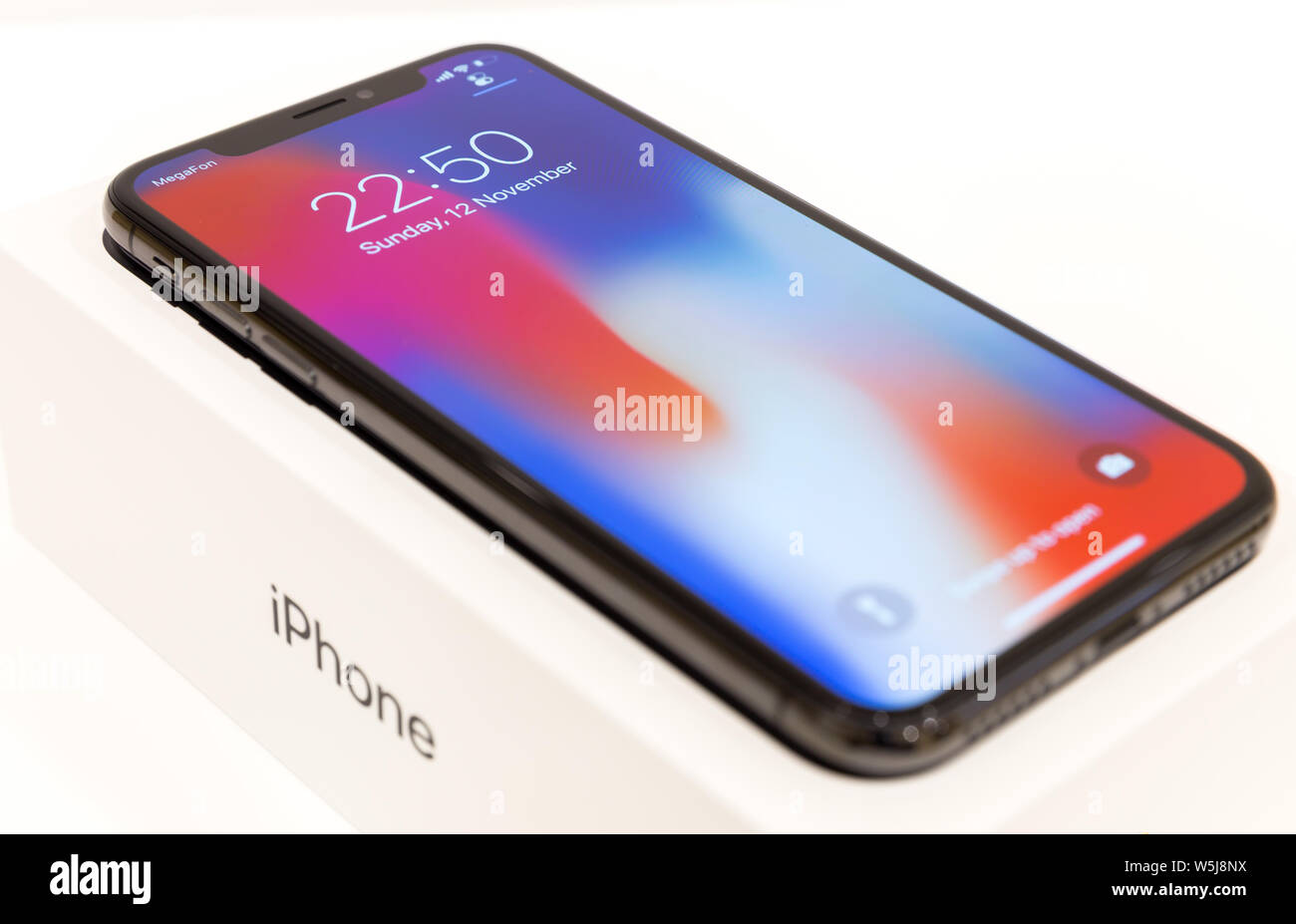 Iphone 12 unboxing hi-res stock photography and images - Alamy