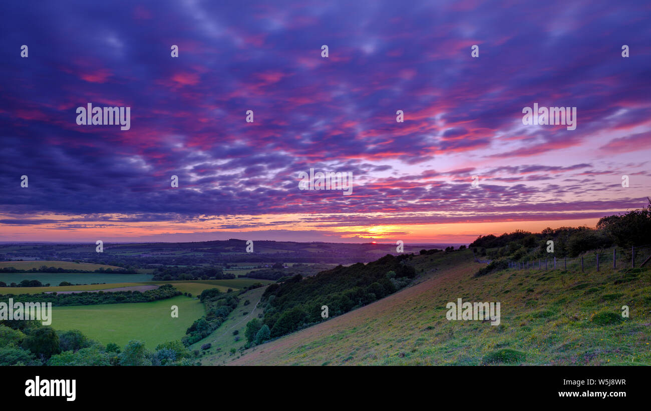 West Meon, UK - June 14, 2019: Mid-summer sunset over Old Winchester ...