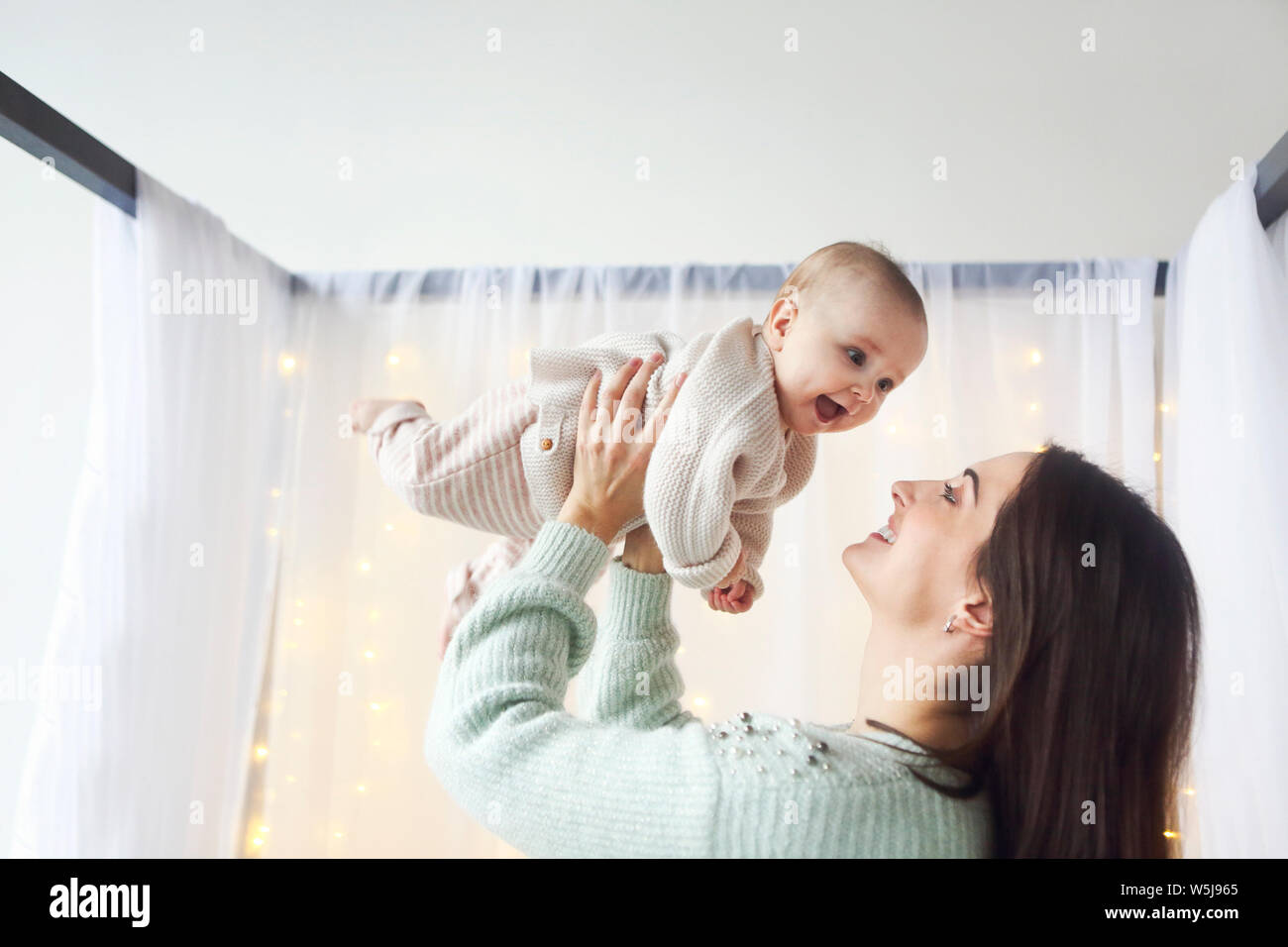 Portrait of the happy mother with her little baby Stock Photo - Alamy