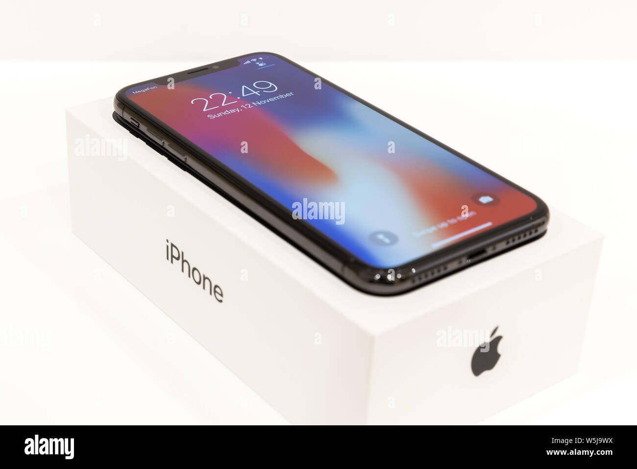 Iphone 12 unboxing hi-res stock photography and images - Alamy