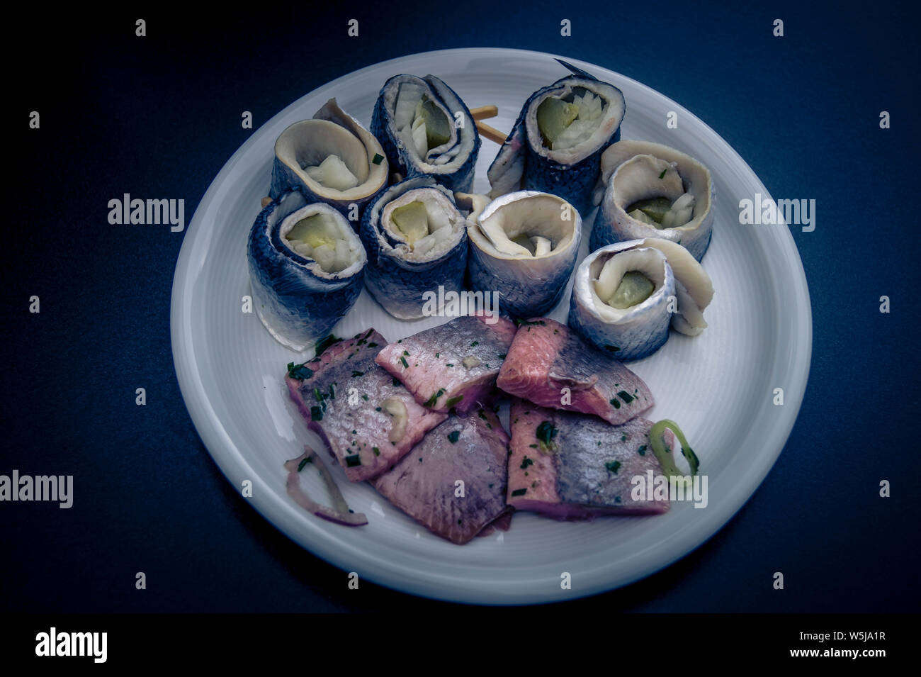 delicious seafood atlantic hering with potatoes and sauce Stock Photo ...