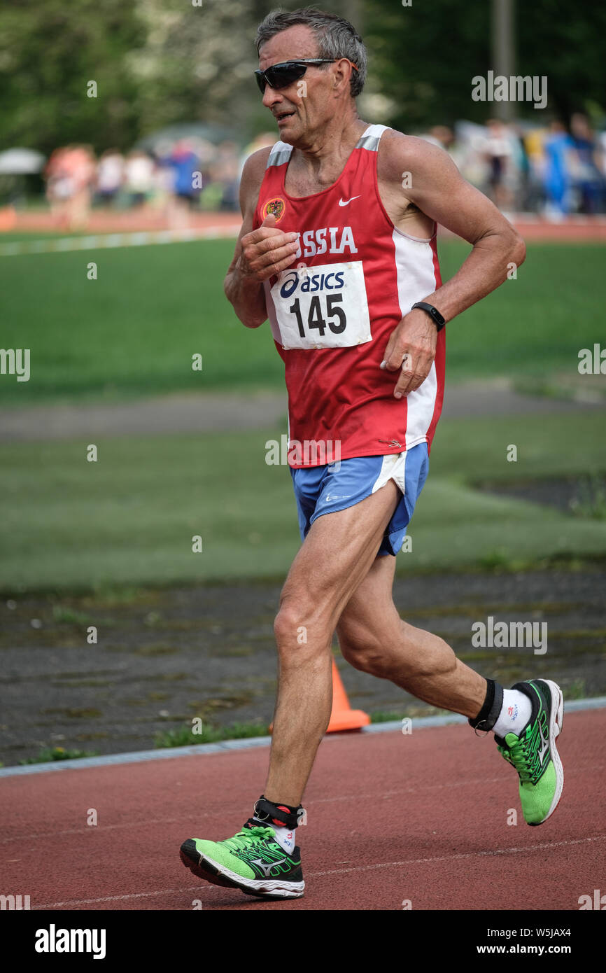 MOSCOW, RUSSIA - MAY 10, 2019: Russian athlete is running on tournament ...