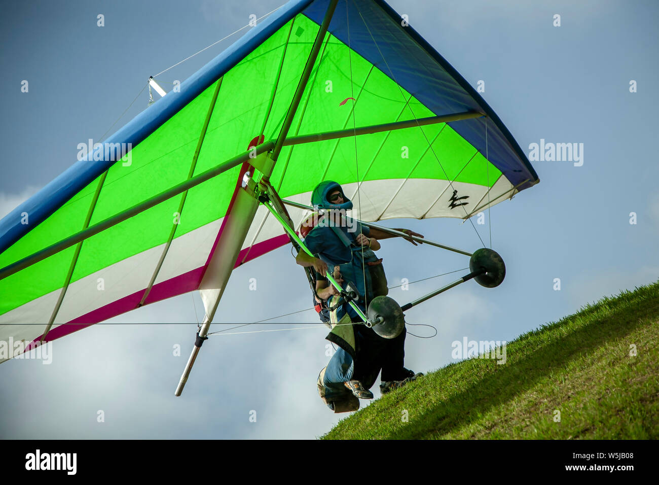 Launching hang glider with Team Spirit, Canovanas, Puerto Rico Stock ...