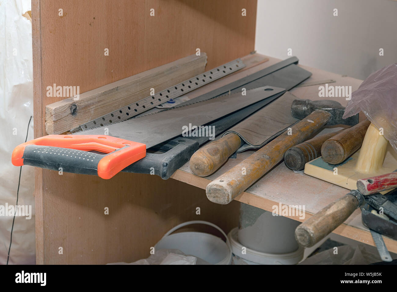 Carpenter's tools on the shelf. Saw, hammer, chisel, and so on Stock ...