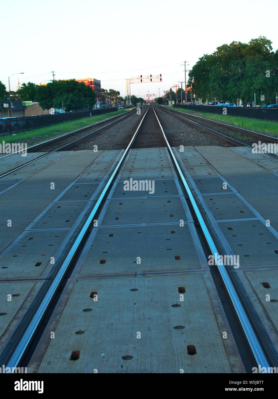 three merging railroad tracks Stock Photo - Alamy