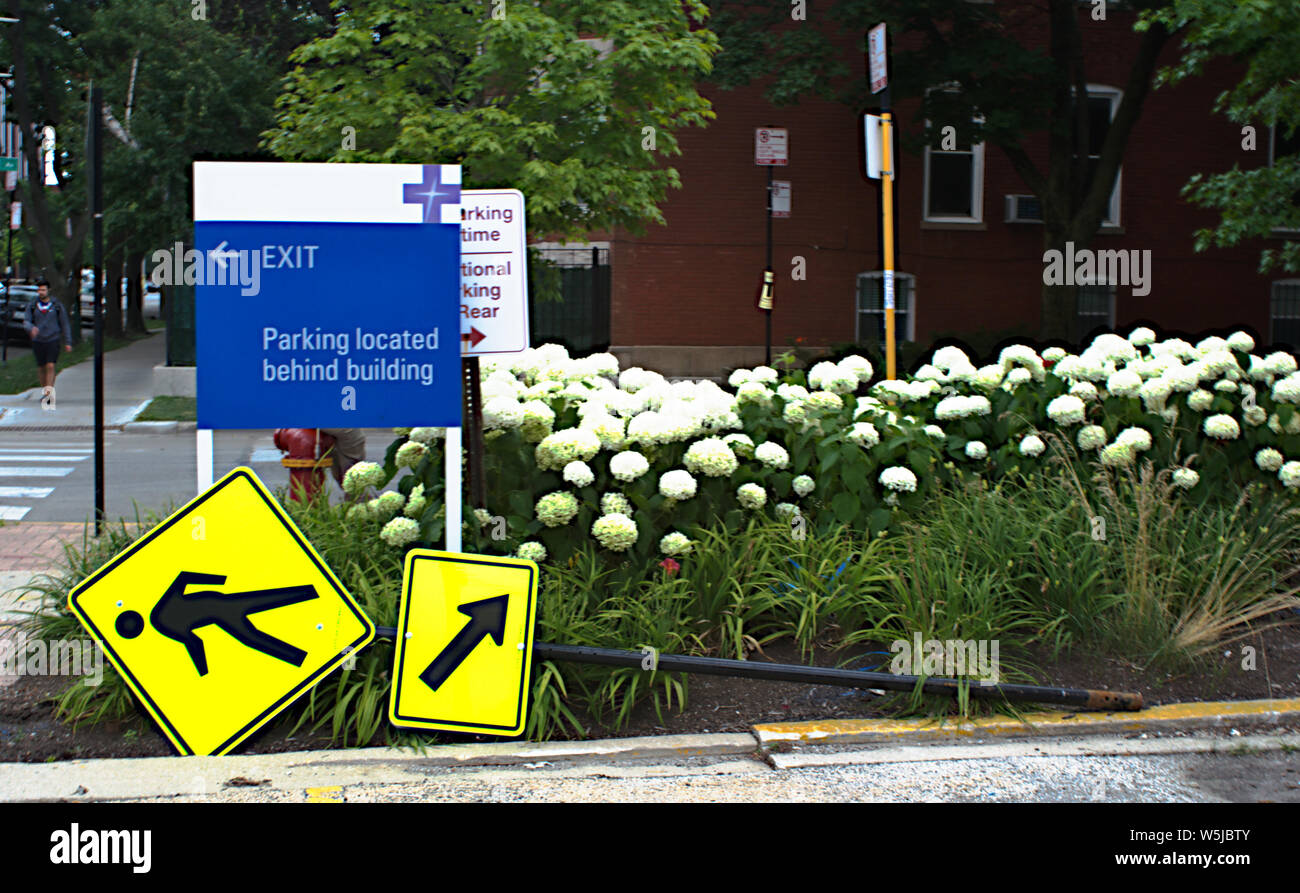 fallen walk and arrow sign Stock Photo - Alamy