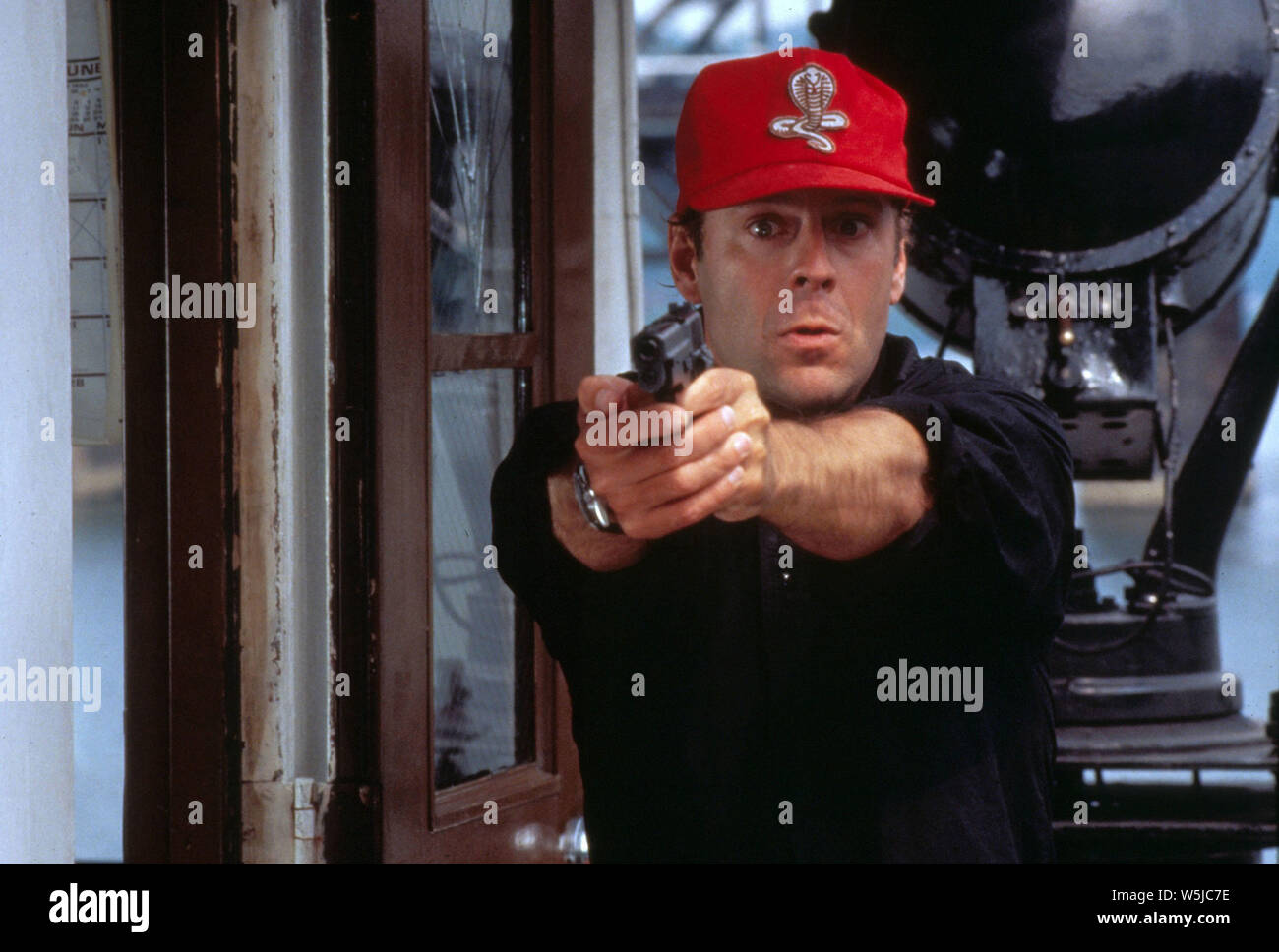 BRUCE WILLIS in STRIKING DISTANCE (1993), directed by ROWDY HERRINGTON ...