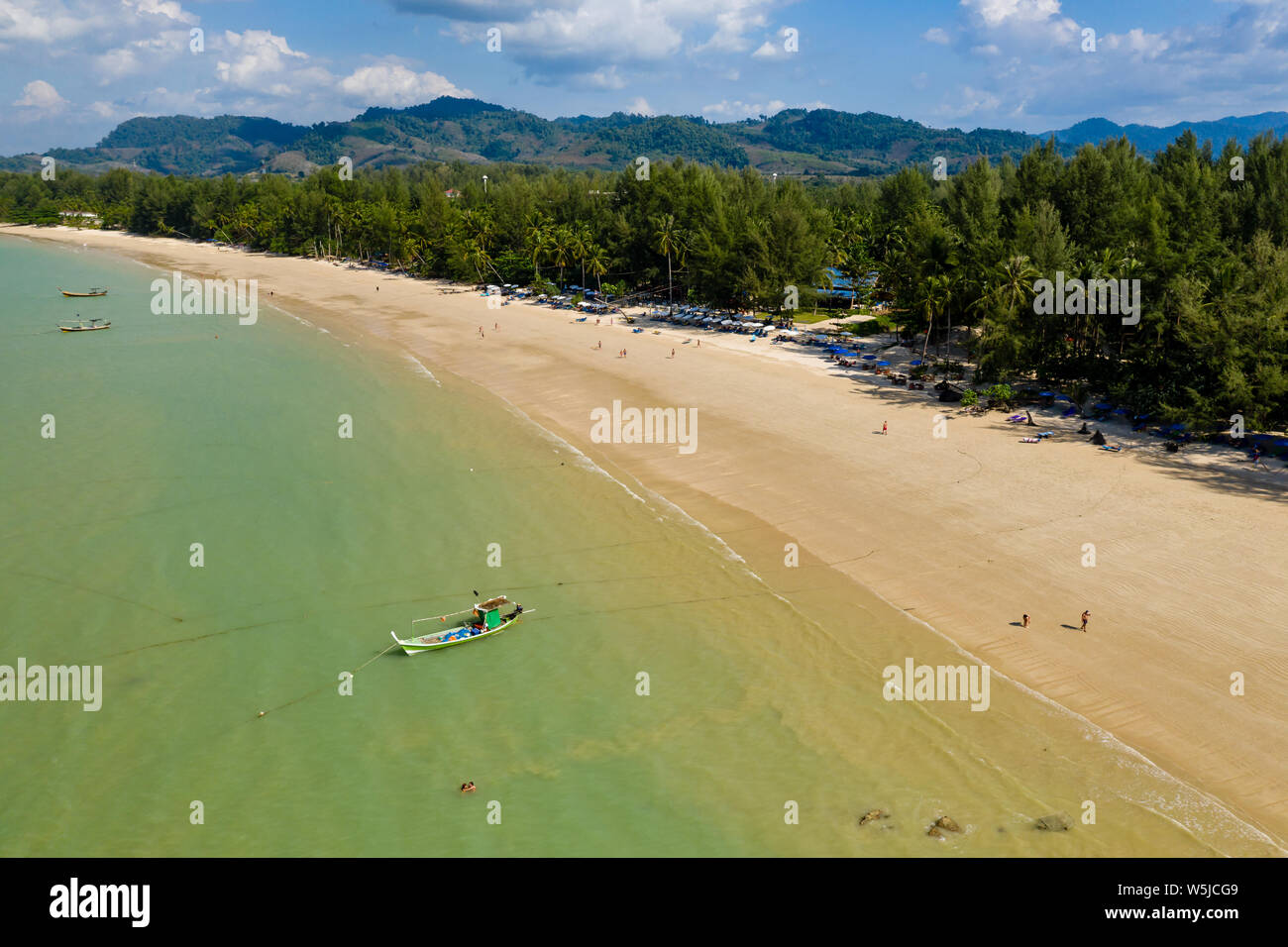 Aerial view of a quiet tropical sandy beach and shallow ocean (Coconut ...