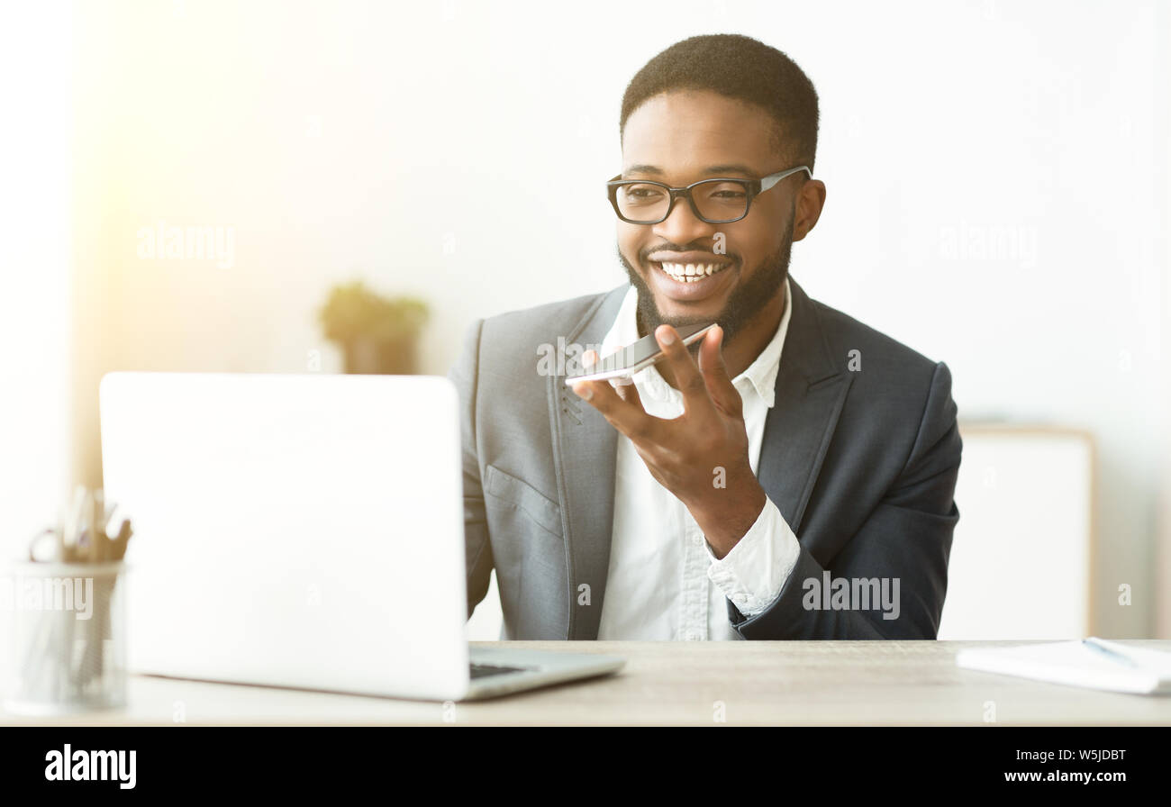 African man using voice hi-res stock photography and images - Alamy