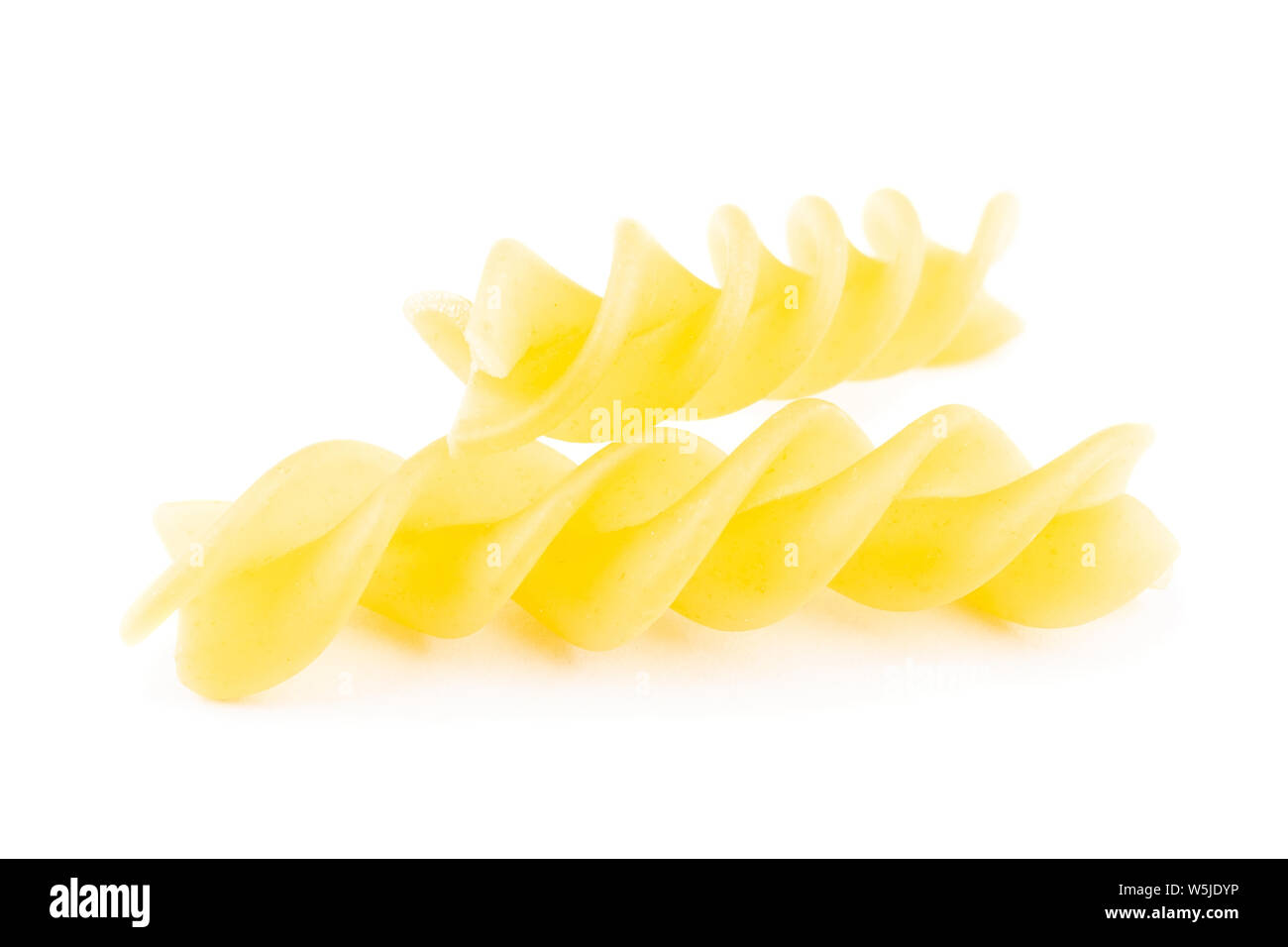 uncooked fusilli pasta noodles isolated on white background Stock Photo ...