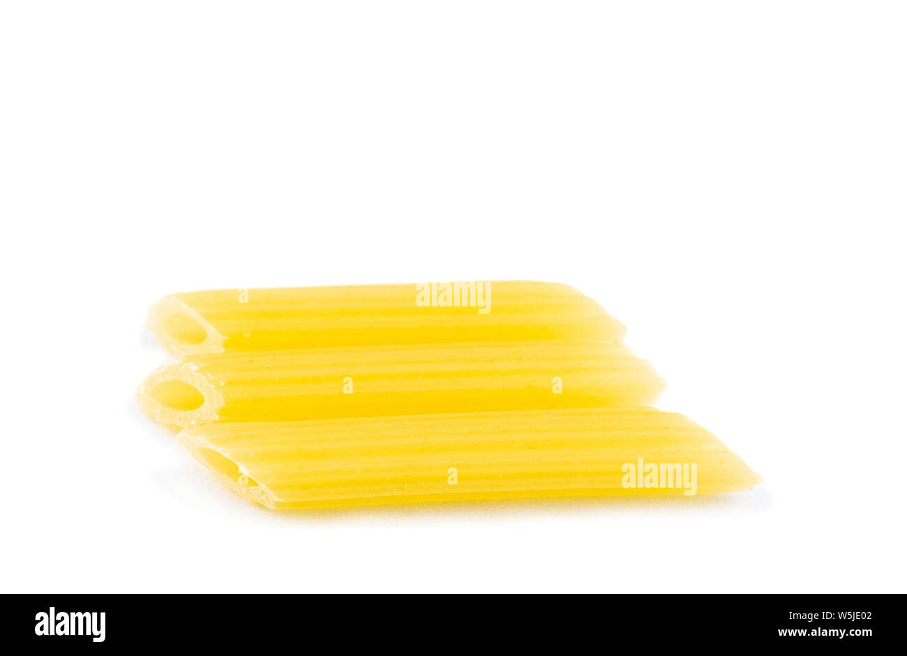 Raw Pasta Pennine Rigate , top view , isolated over white Stock Photo ...