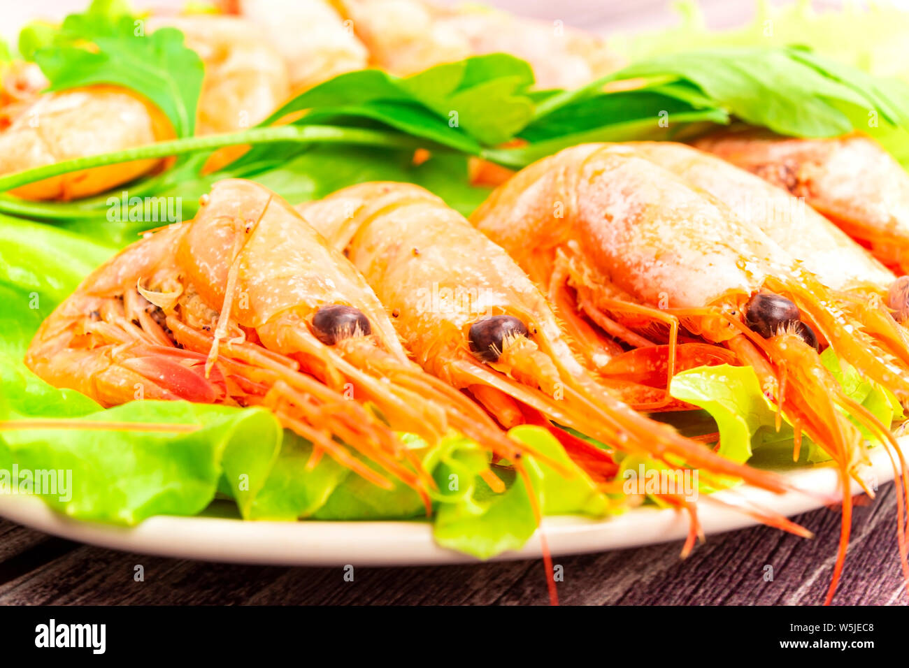 Cooked Atlantic prawns served with parsley and lemon salad Stock Photo - Alamy