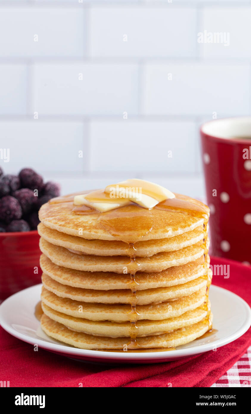 Stack of Freshly Made Pancakes on a Gingham Tablecloth Stock Photo - Alamy