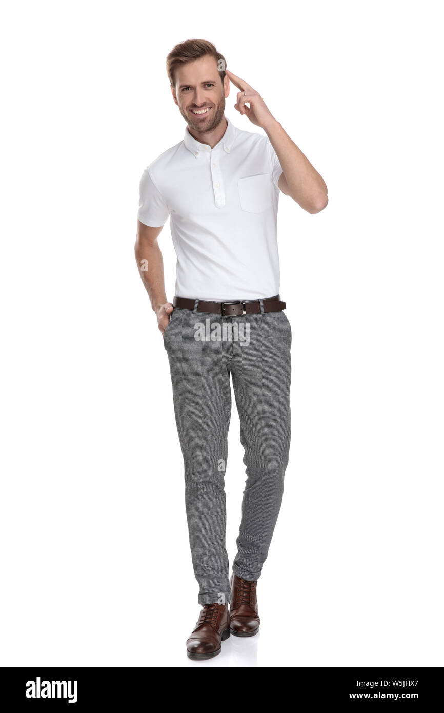 happy young casual man giving a military salute and greets everyone on ...