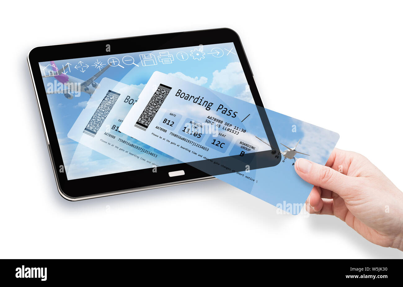 Online booking with hand of a woman taking an airplane ticket from a ...