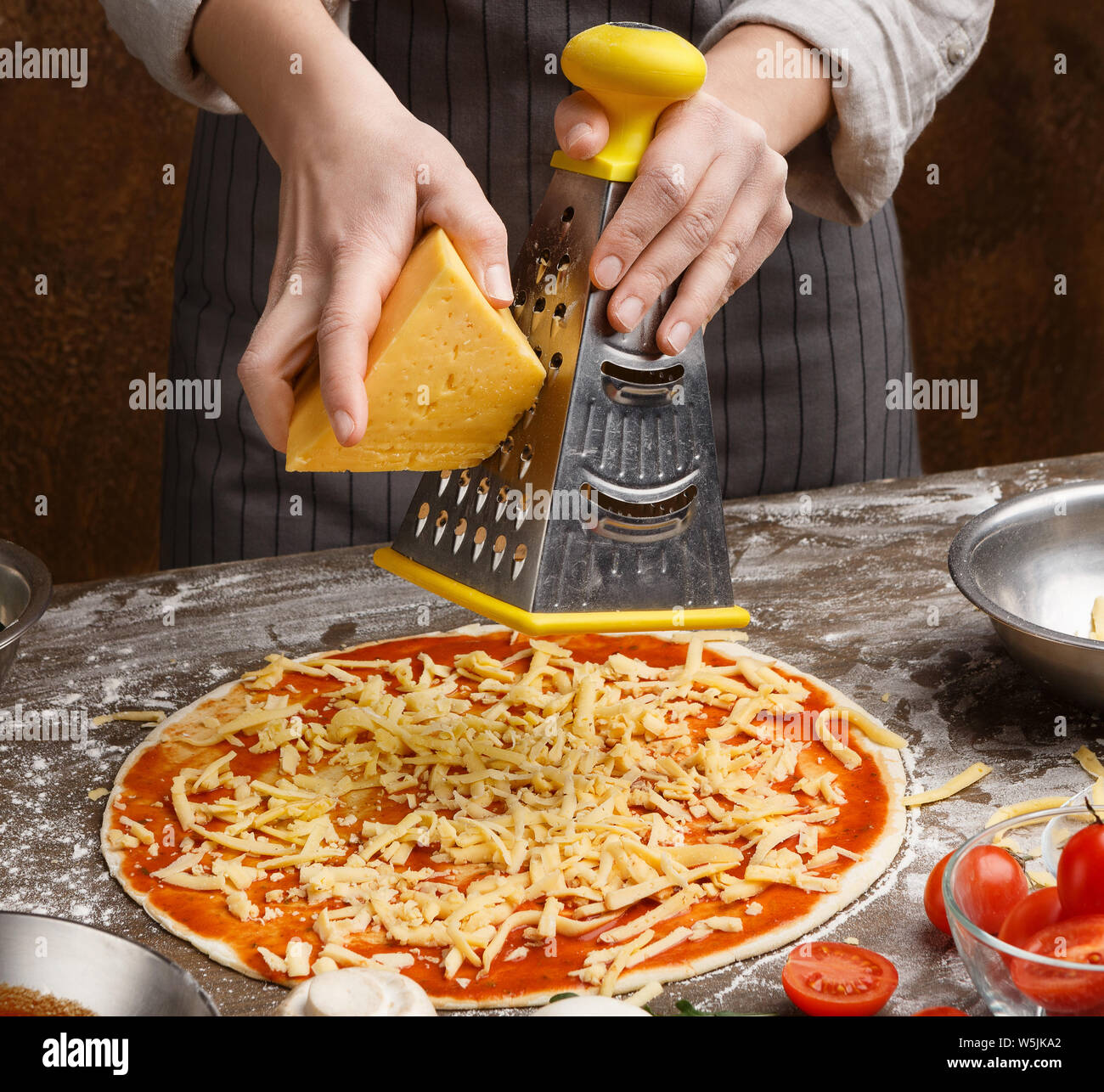 Grating cheese sauce hi-res stock photography and images - Alamy