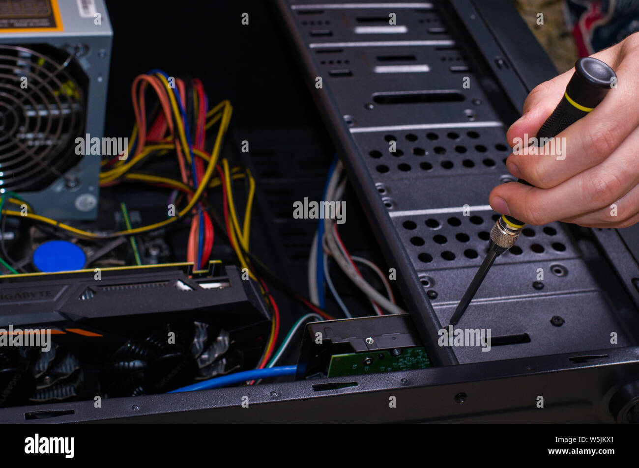 Technician repairing broken pc desktop hi-res stock photography and ...