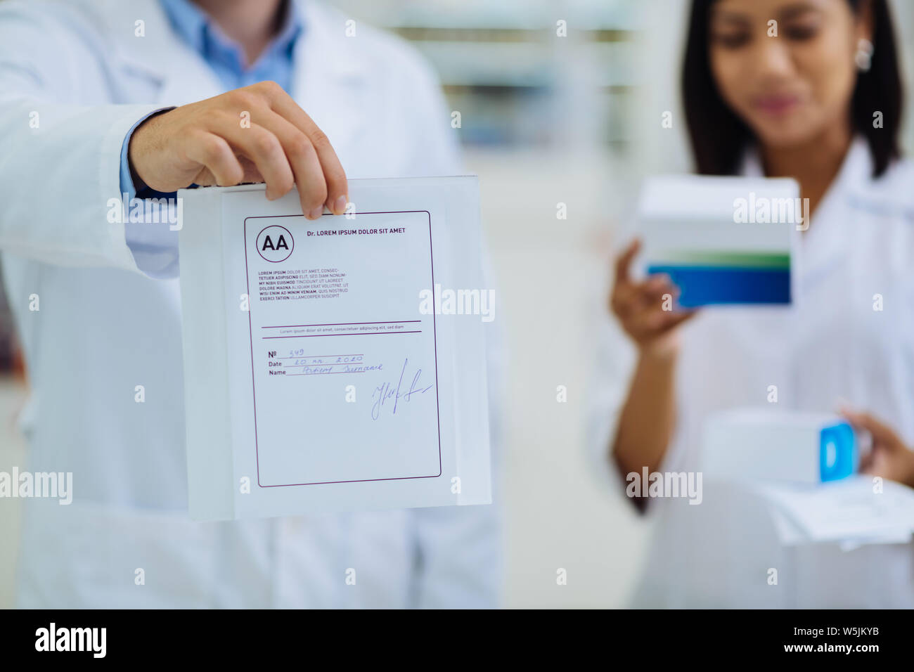 Close up of male hand that holding certificate Stock Photo - Alamy