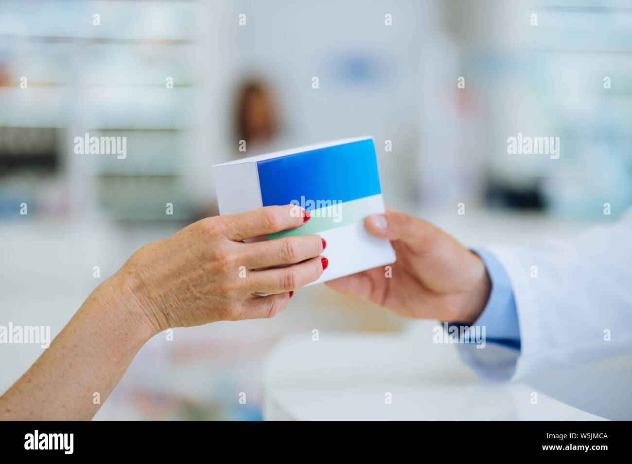 Close up of female hand that taking package Stock Photo - Alamy