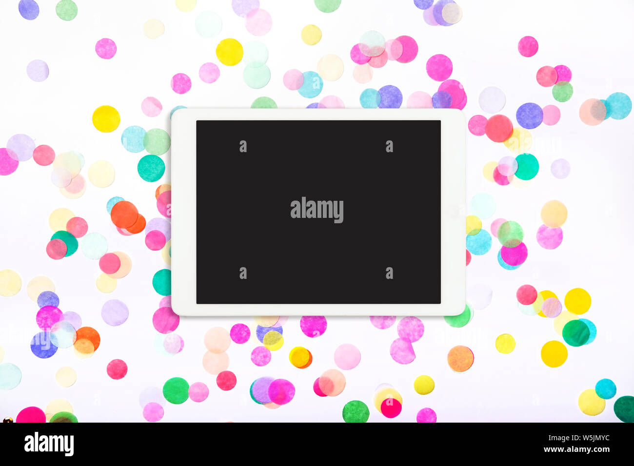 Touchpad with blank touchscreen with confetti on white background. Flat ...