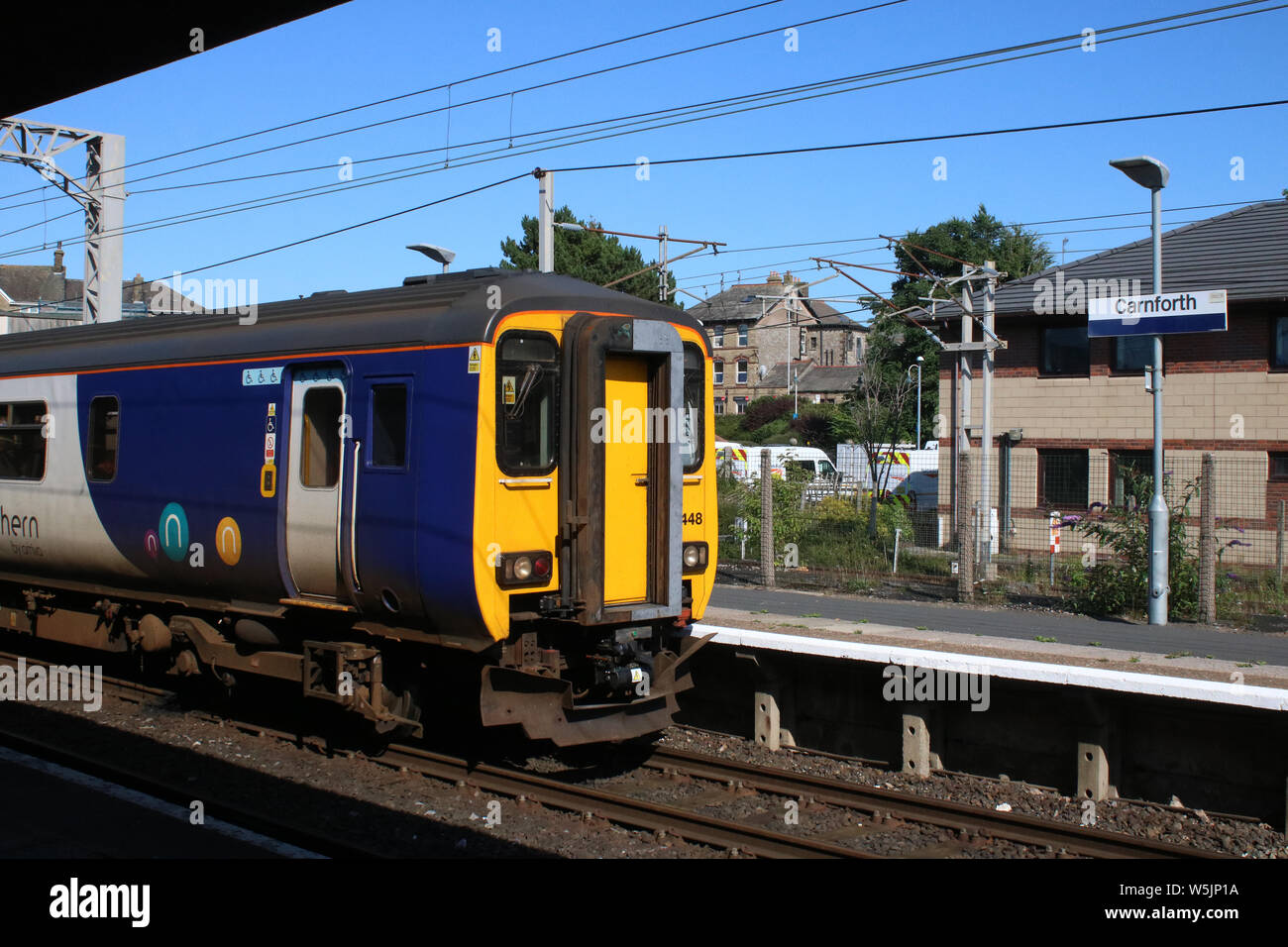 Class 156 super sprinter diesel multiple unit in Northern livery, Carnforth railway station on ...