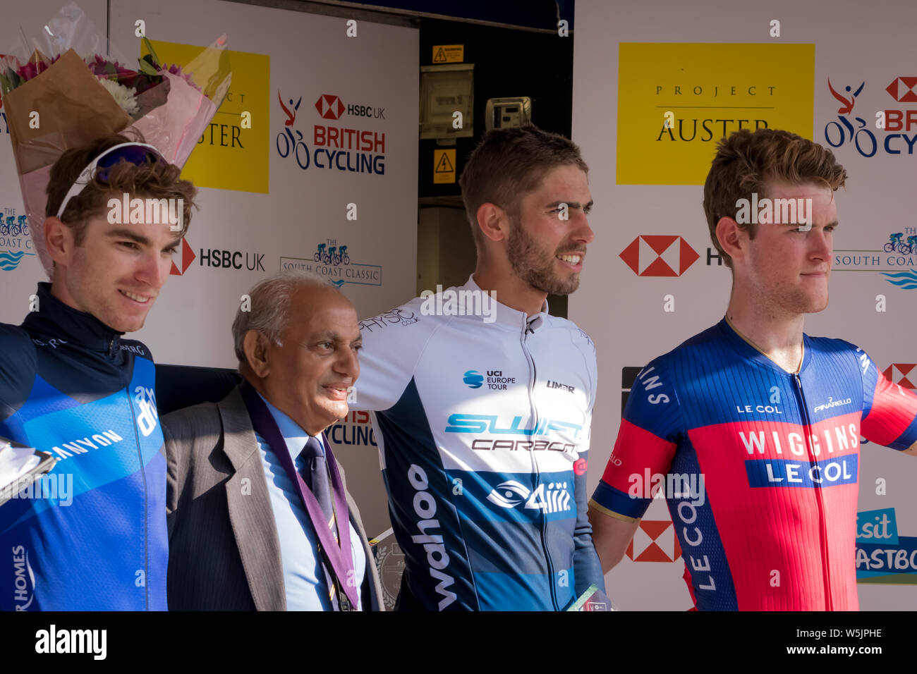 Jacob Scott (centre) wins the 2019 South Coast Classic Cycle race with ...