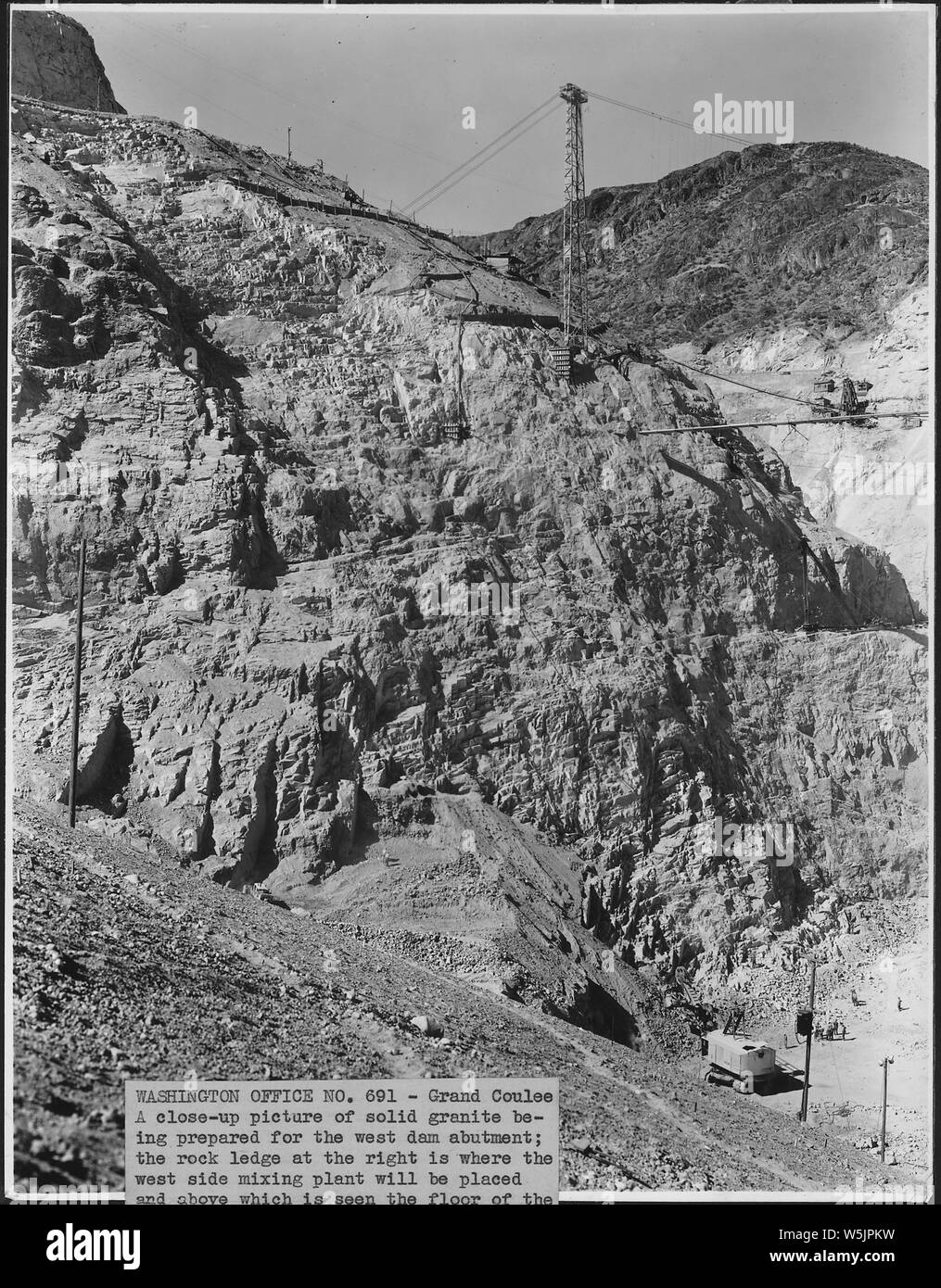 A close-up picture of solid granite being prepared for the west dam ...