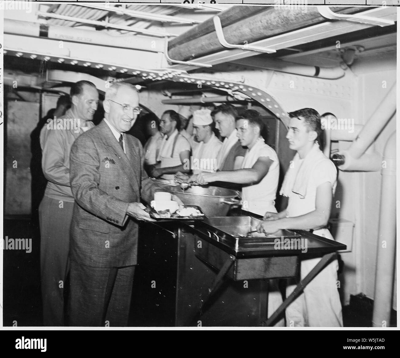 Accompanied by George Drescher, President Harry S. Truman carried his ...