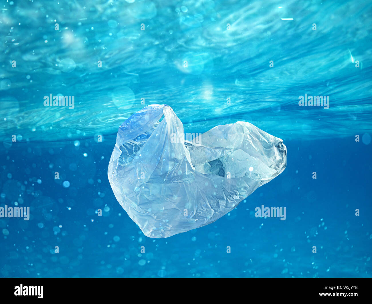 Floating bag. Problem of plastic pollution under the sea concept Stock ...