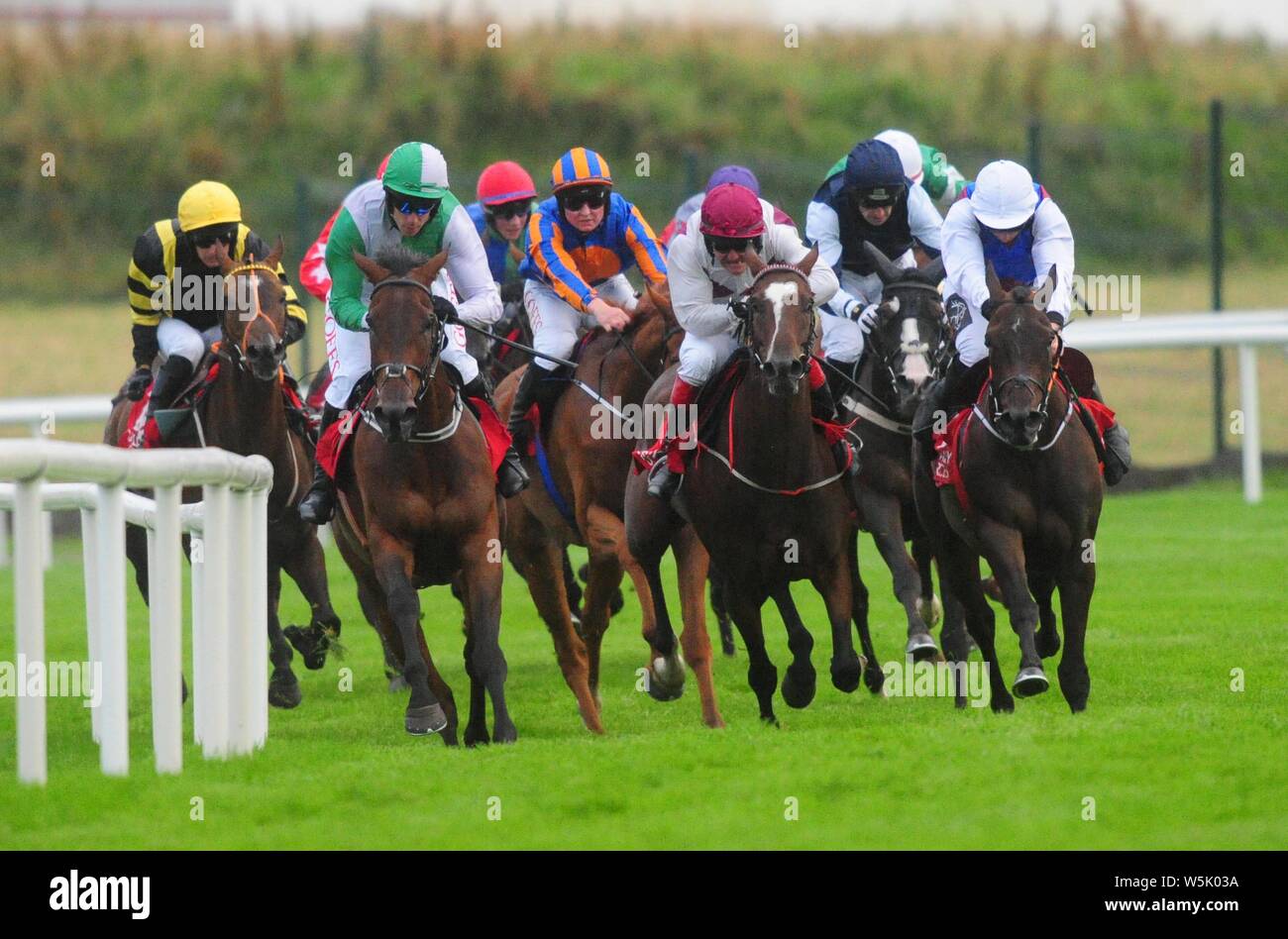 Russian Diamond & Derek O'Connor (second left) turn into the home ...