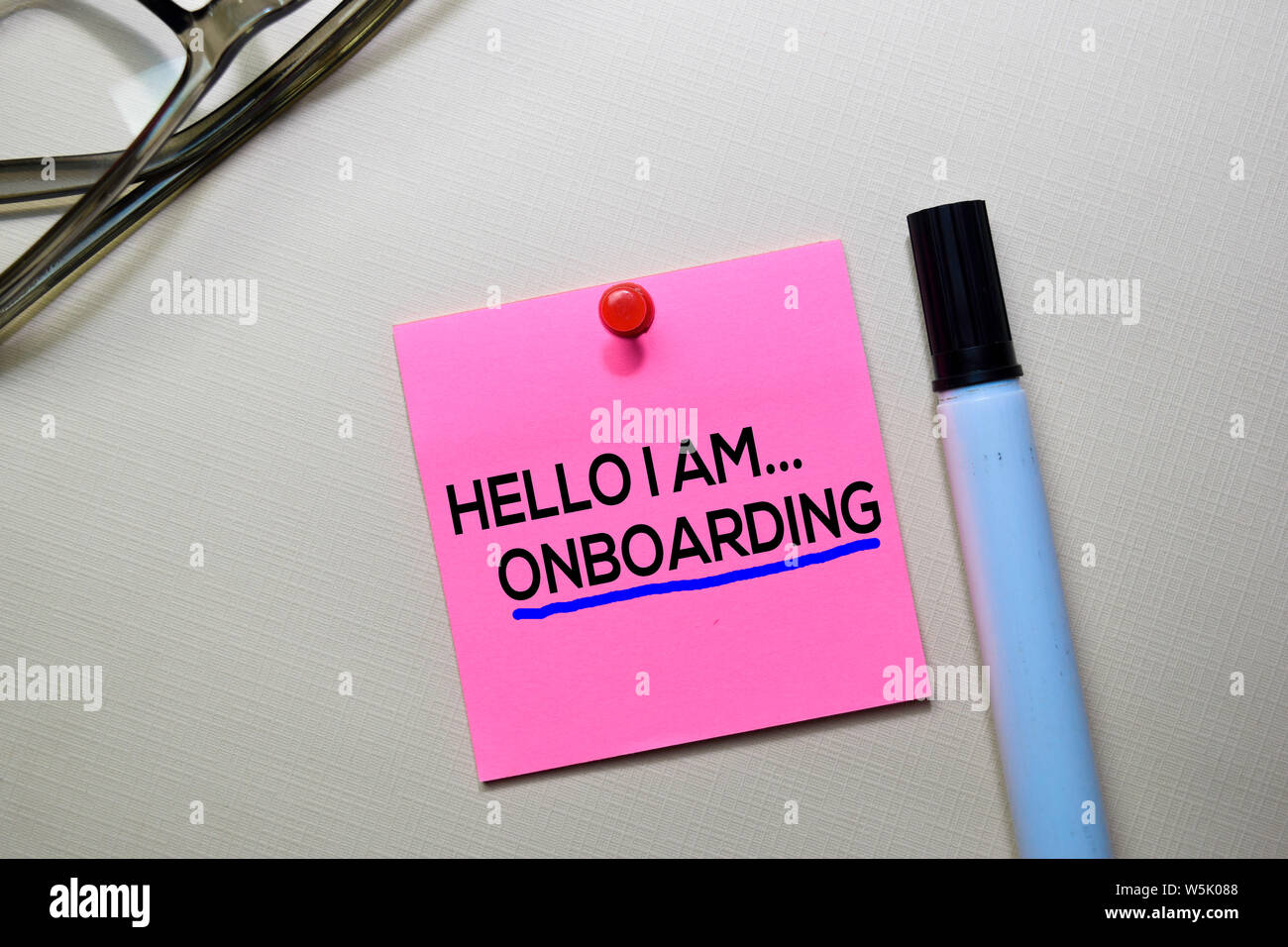Hello I am Onboarding text on sticky notes isolated on office desk ...