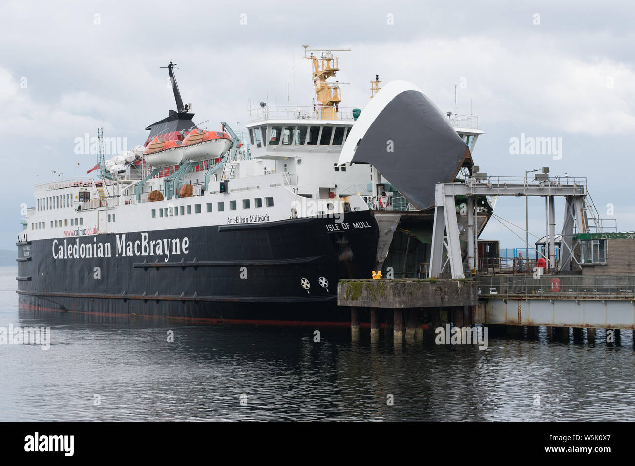 Caledonian Macbrayne ferry with open bow door loading cars at a ...