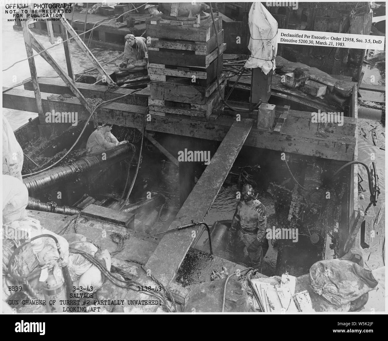 BB 39, 1138-43 Salvage- Gun Chamber of Turret #2, partially unwatereed ...