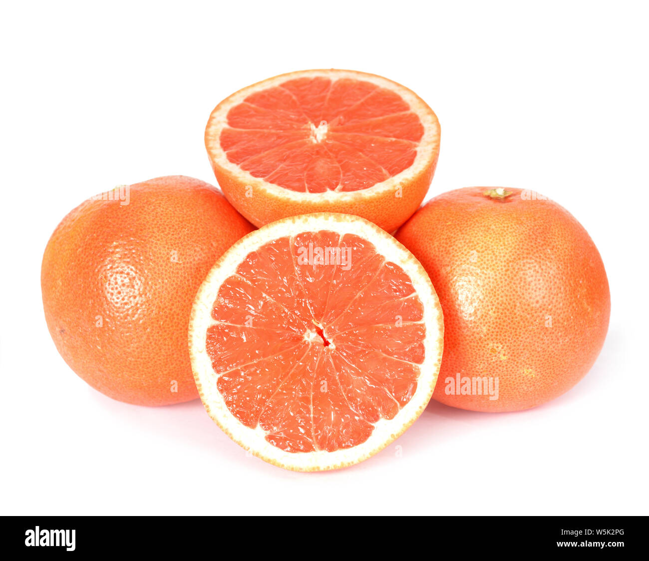 haft and whole orange fruit isolated on white Stock Photo - Alamy