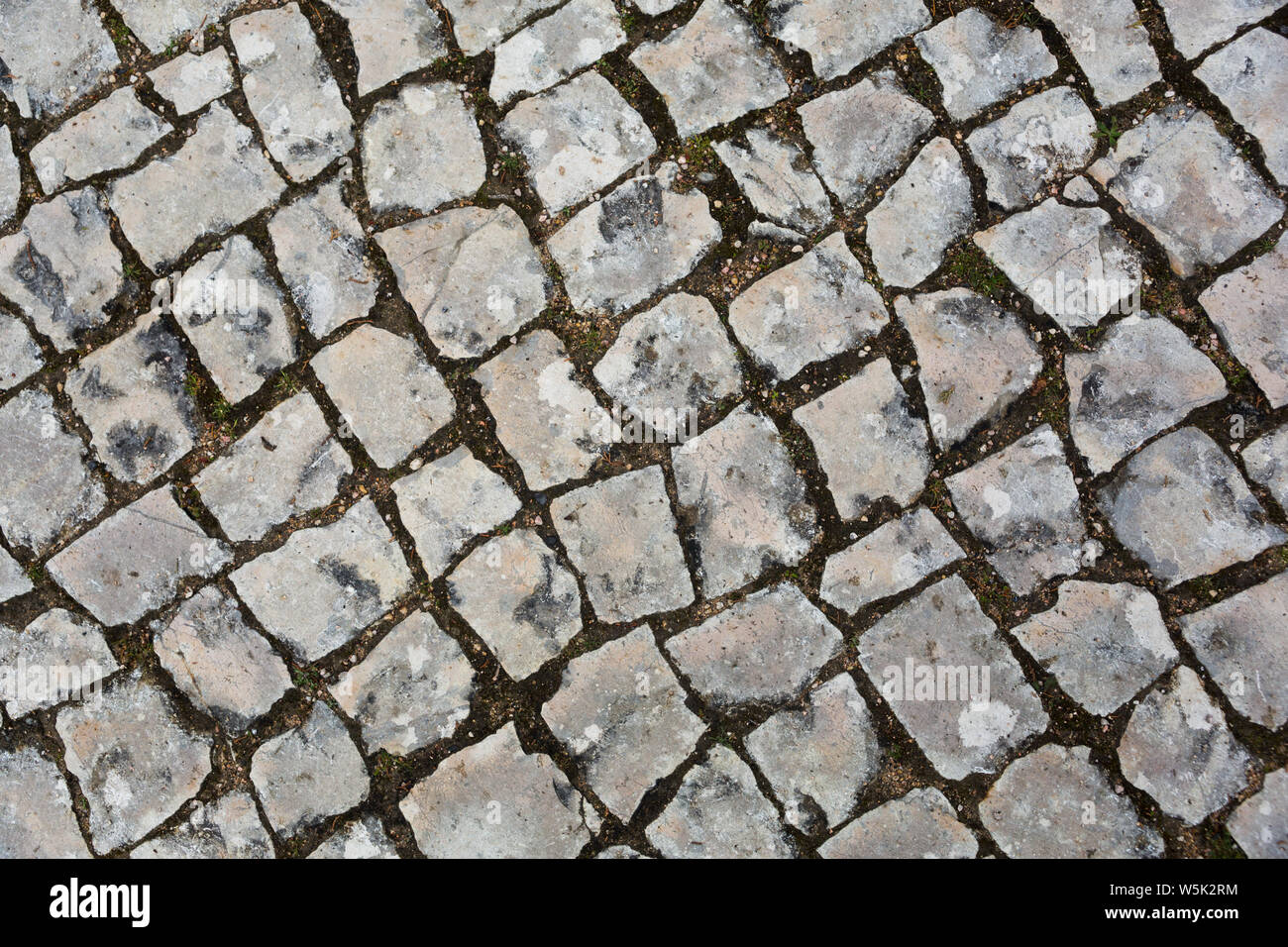 Abstract pattern of grey granite stone block or cobbled paving Convent ...