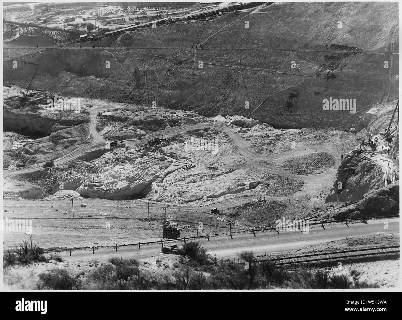 Bedrock for the west end of the dam with upstream slope in the distance ...