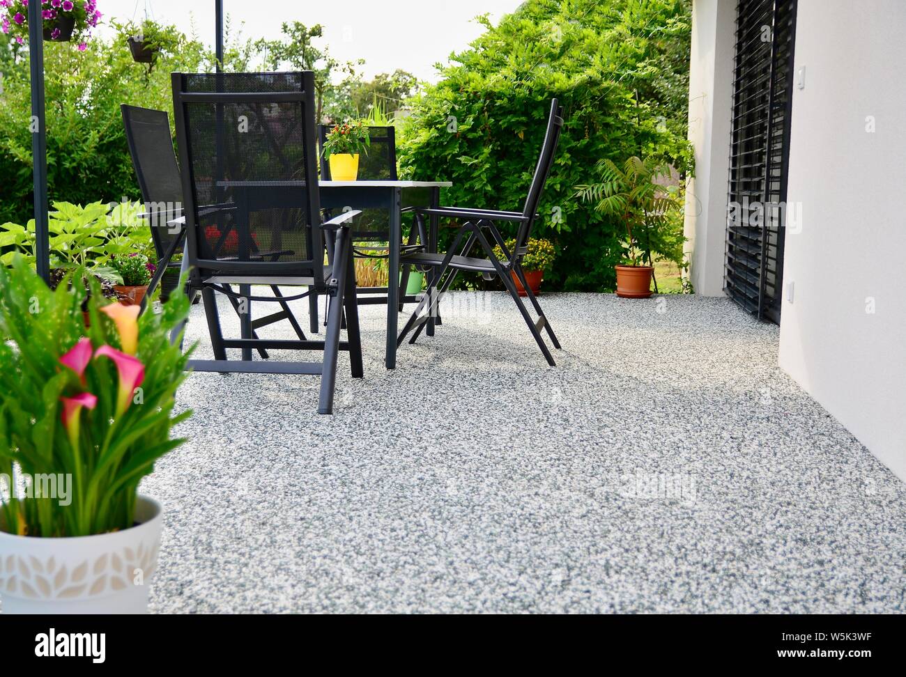Beautiful Terrace with Decorative Natural Stone Floor, Potted Flower ...
