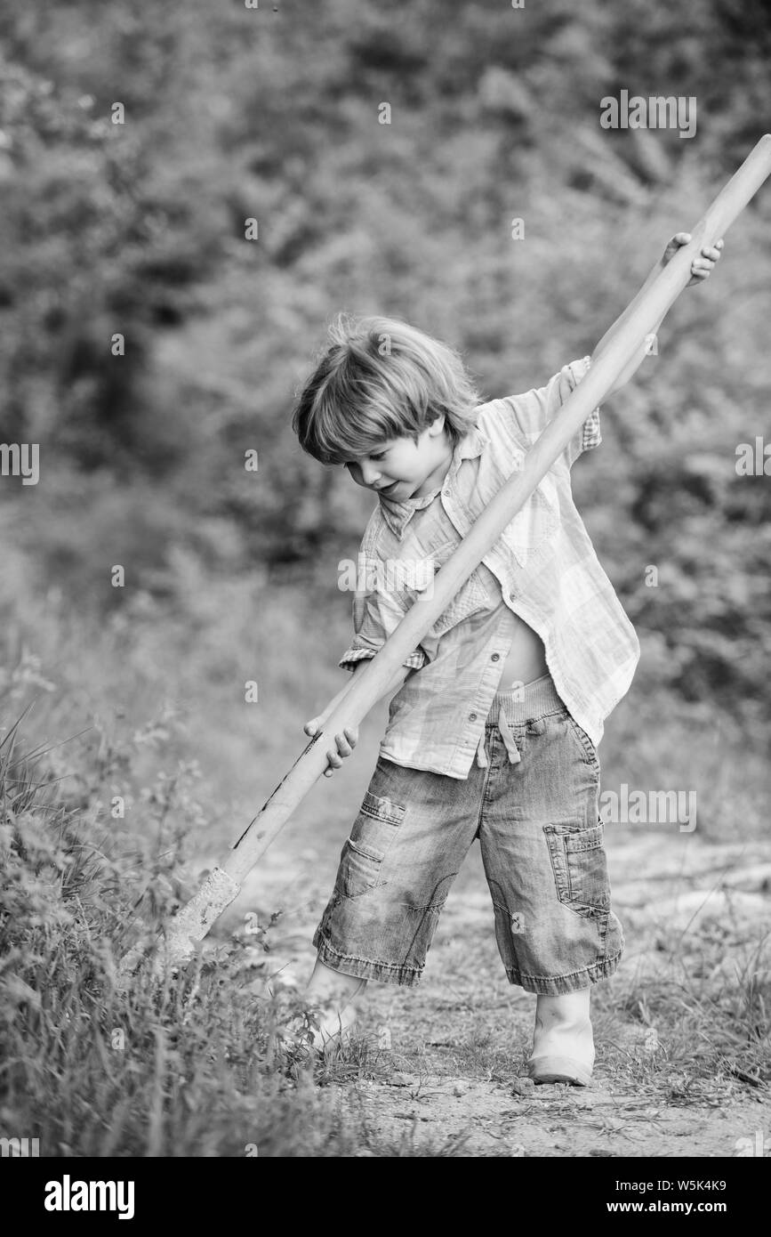 Child boy digging treasure in hi-res stock photography and images - Alamy