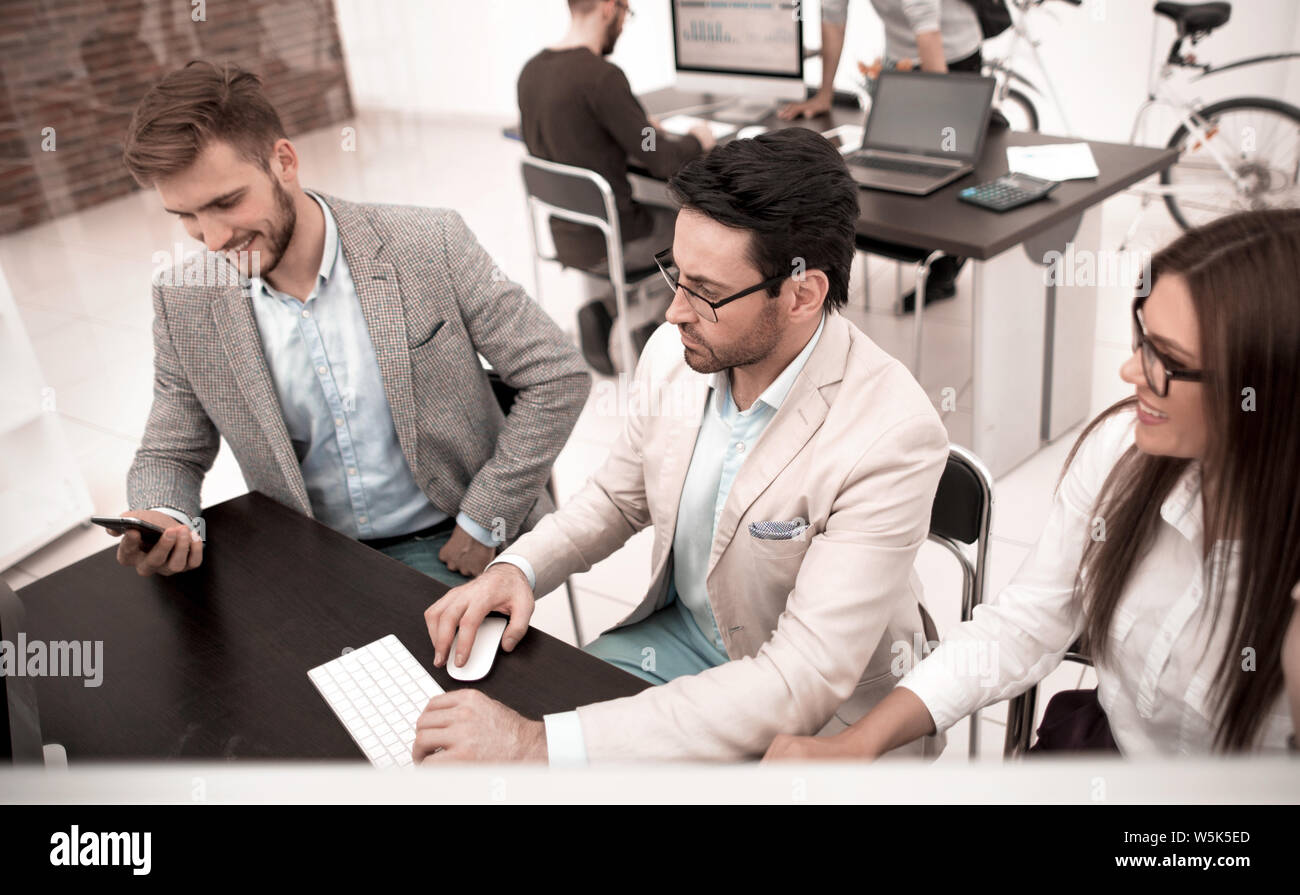 employees in the workplace in a modern office Stock Photo - Alamy