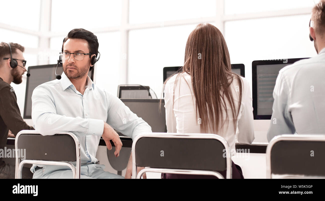 rear view.operator communication in the workplace in the call center ...