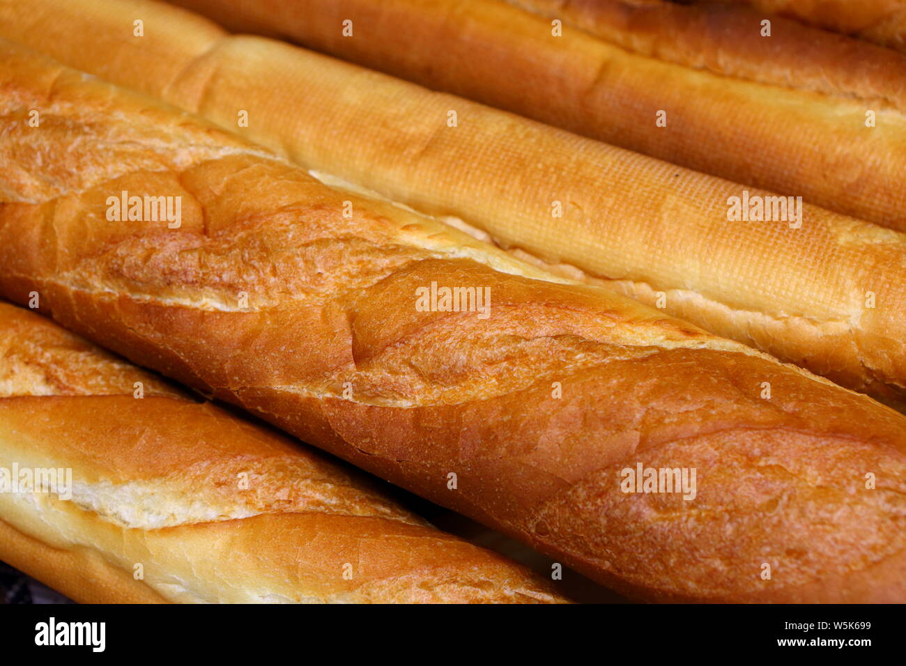 French loaves on the kitchen table Stock Photo - Alamy
