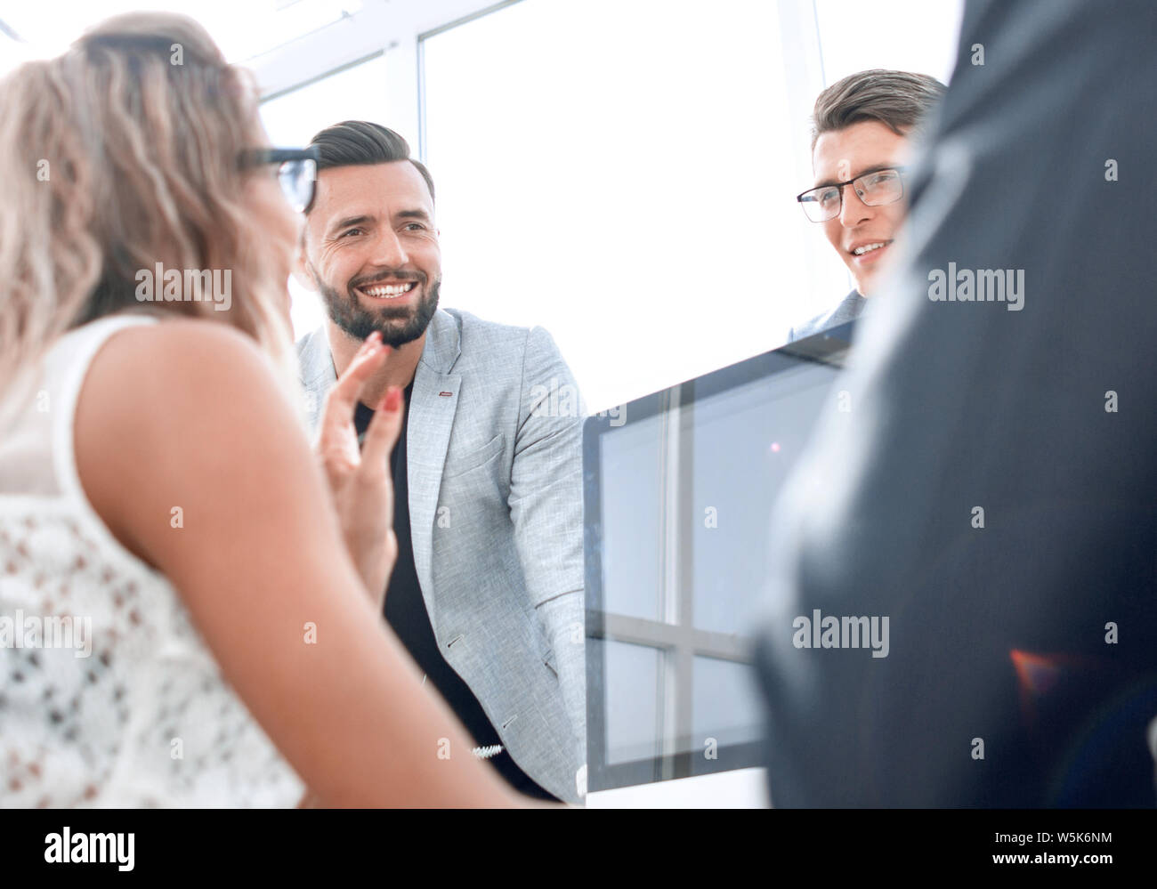 Coworkers team in modern office Stock Photo - Alamy