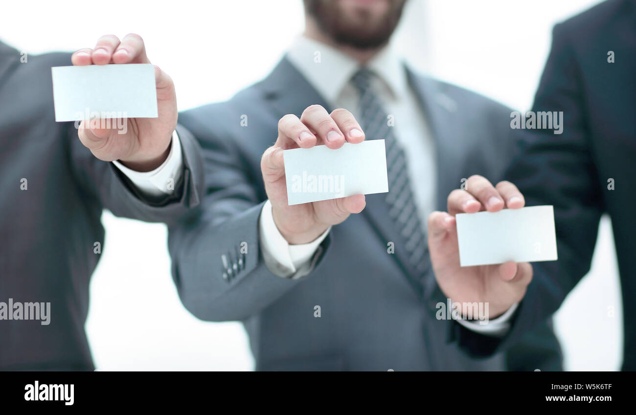 business people showing their business cards Stock Photo - Alamy