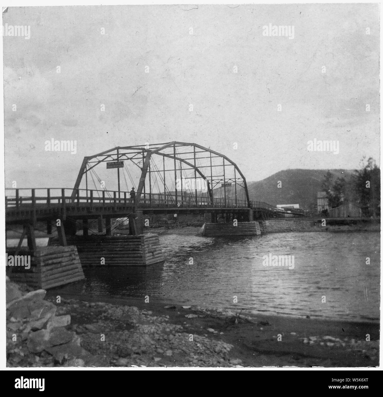 Bridge with sign: Walk your horses Stock Photo - Alamy