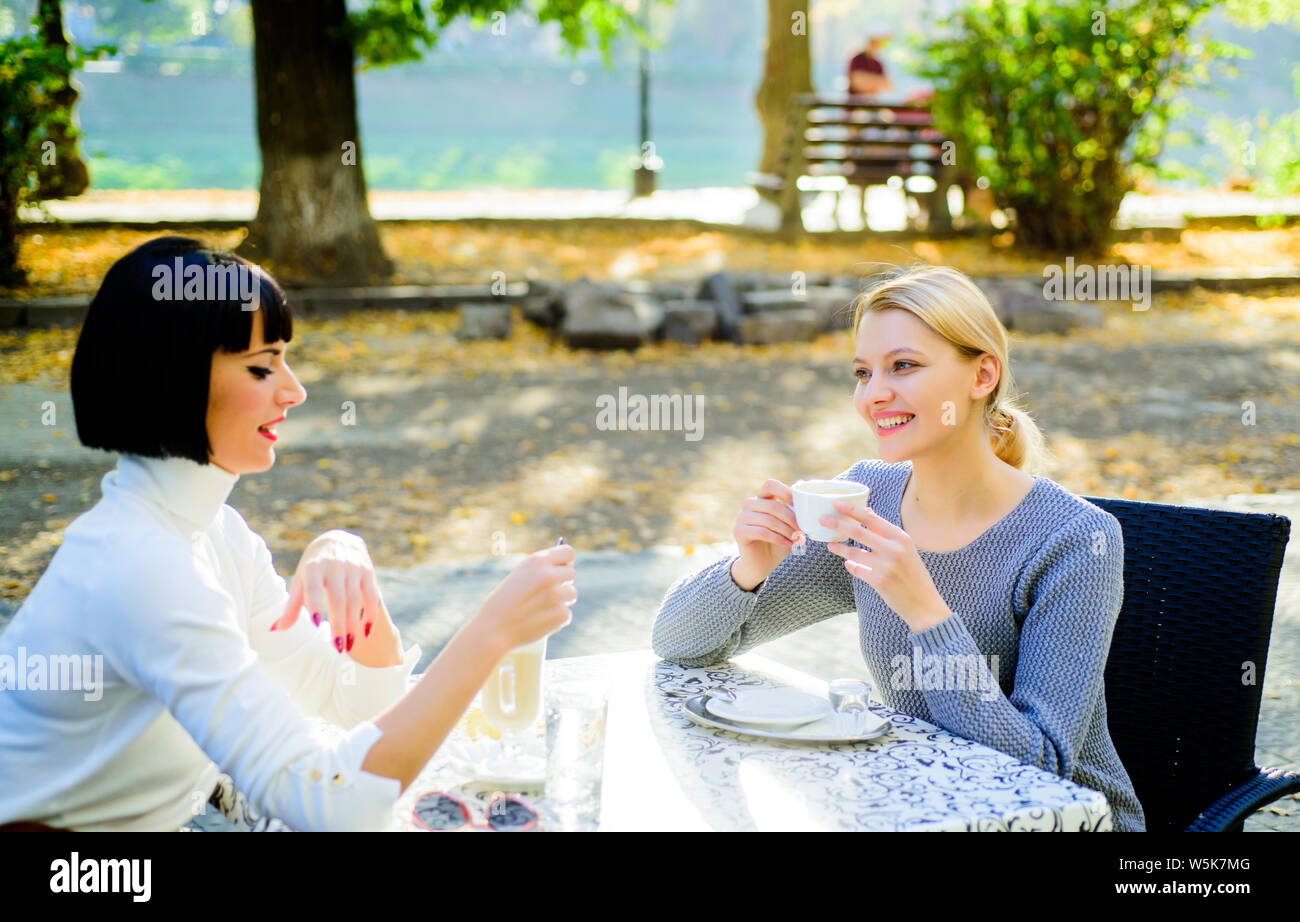 Conversation of two women cafe terrace. Friendship meeting ...