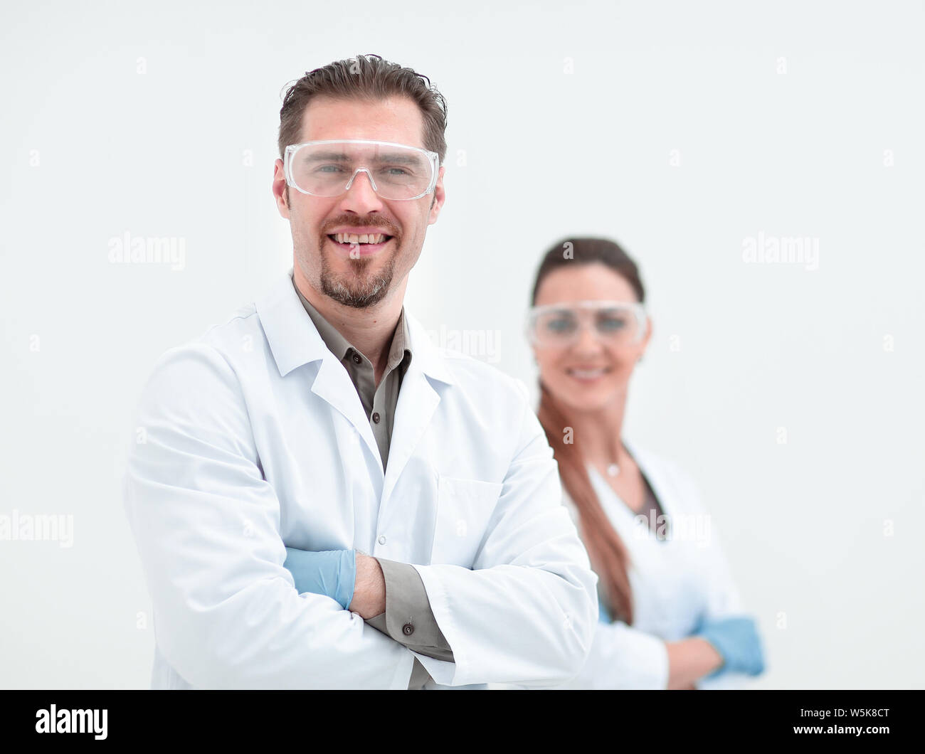 portrait of two successful researchers standing together Stock Photo ...