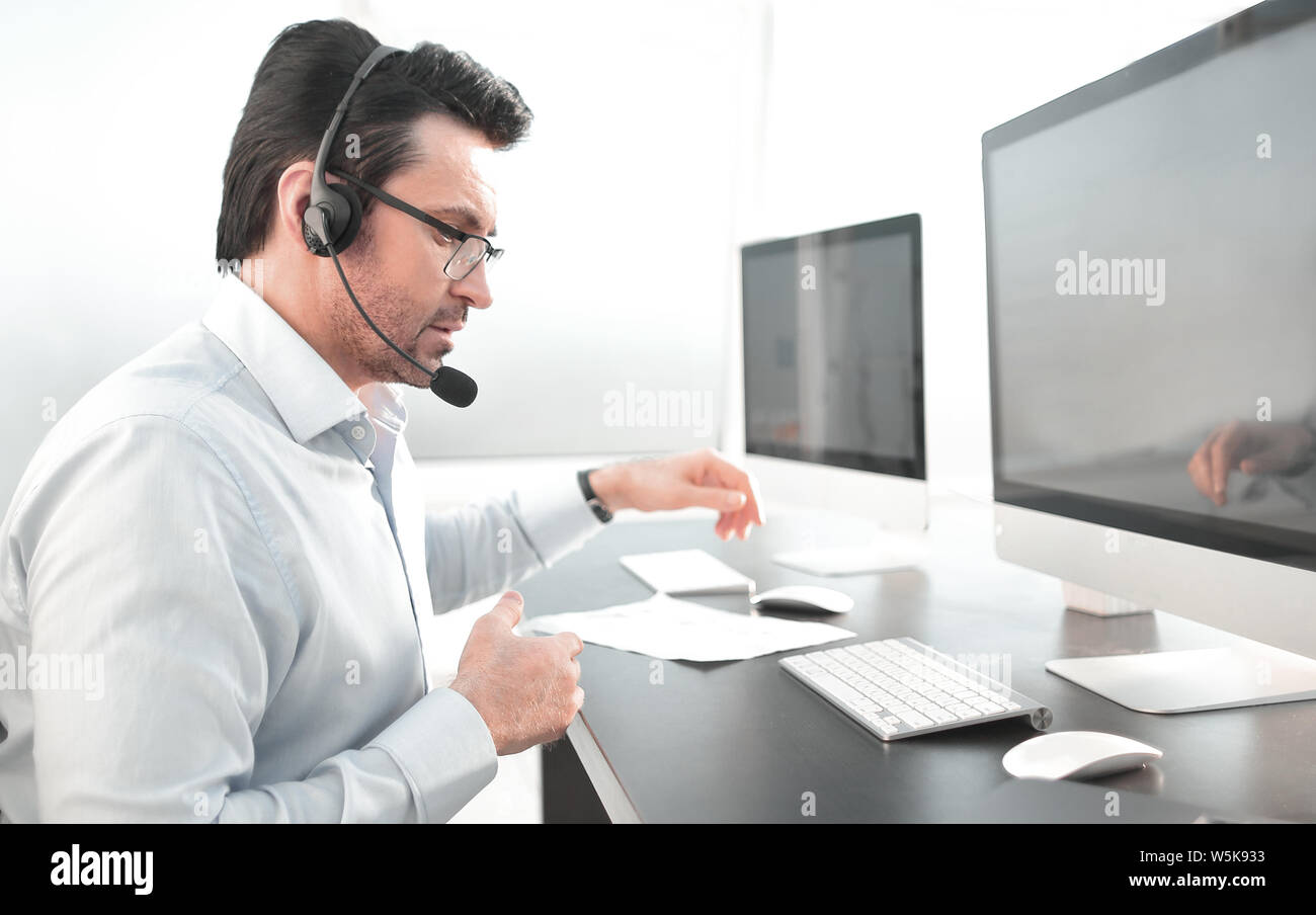 businessman analyzes the data sitting in the office Stock Photo - Alamy